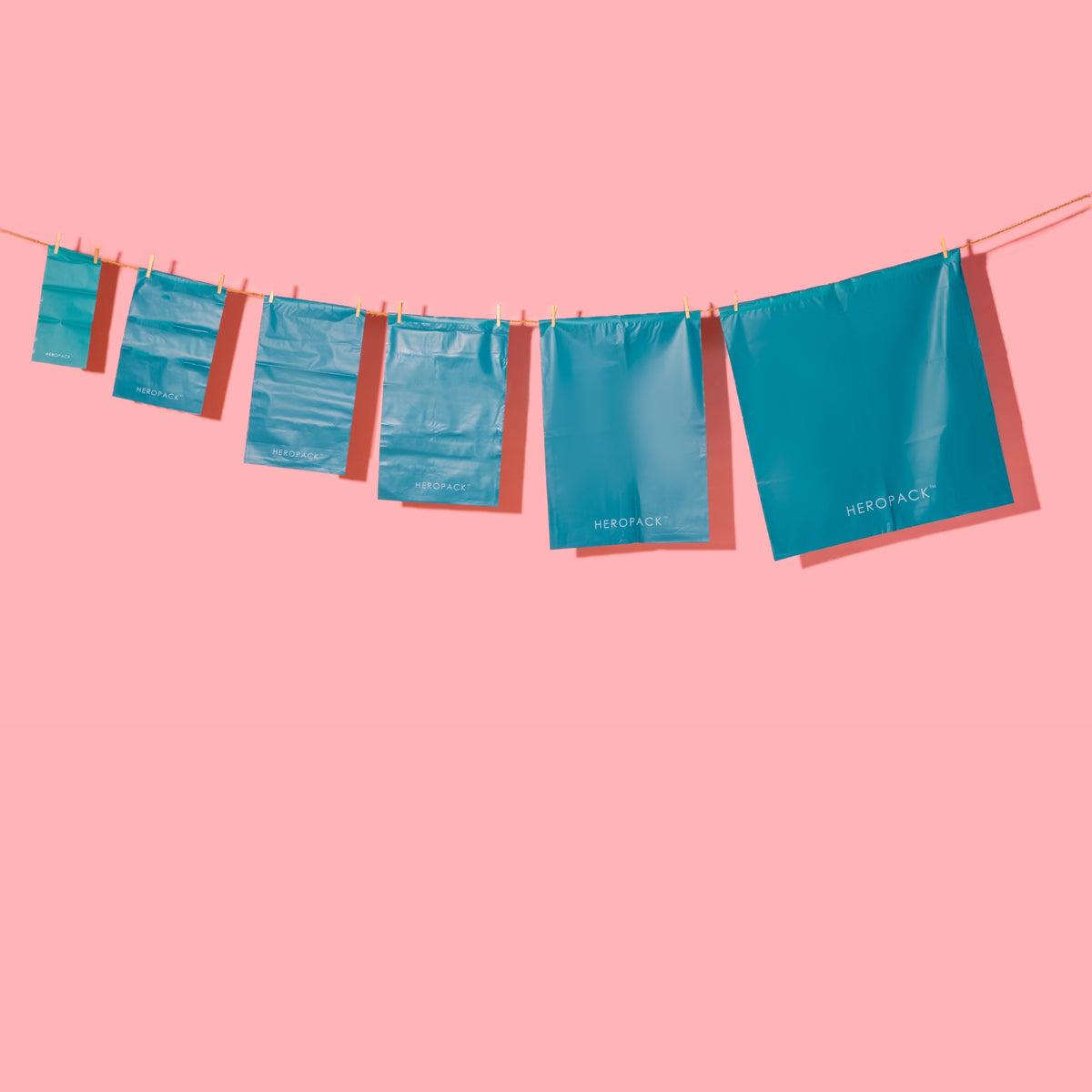 Home Compostable Teal Green Shipping Mailers | Hero Packaging